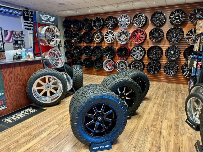 2024-Trinity-Motorsports-showroom-wheel-wall - Trinity Motorsports